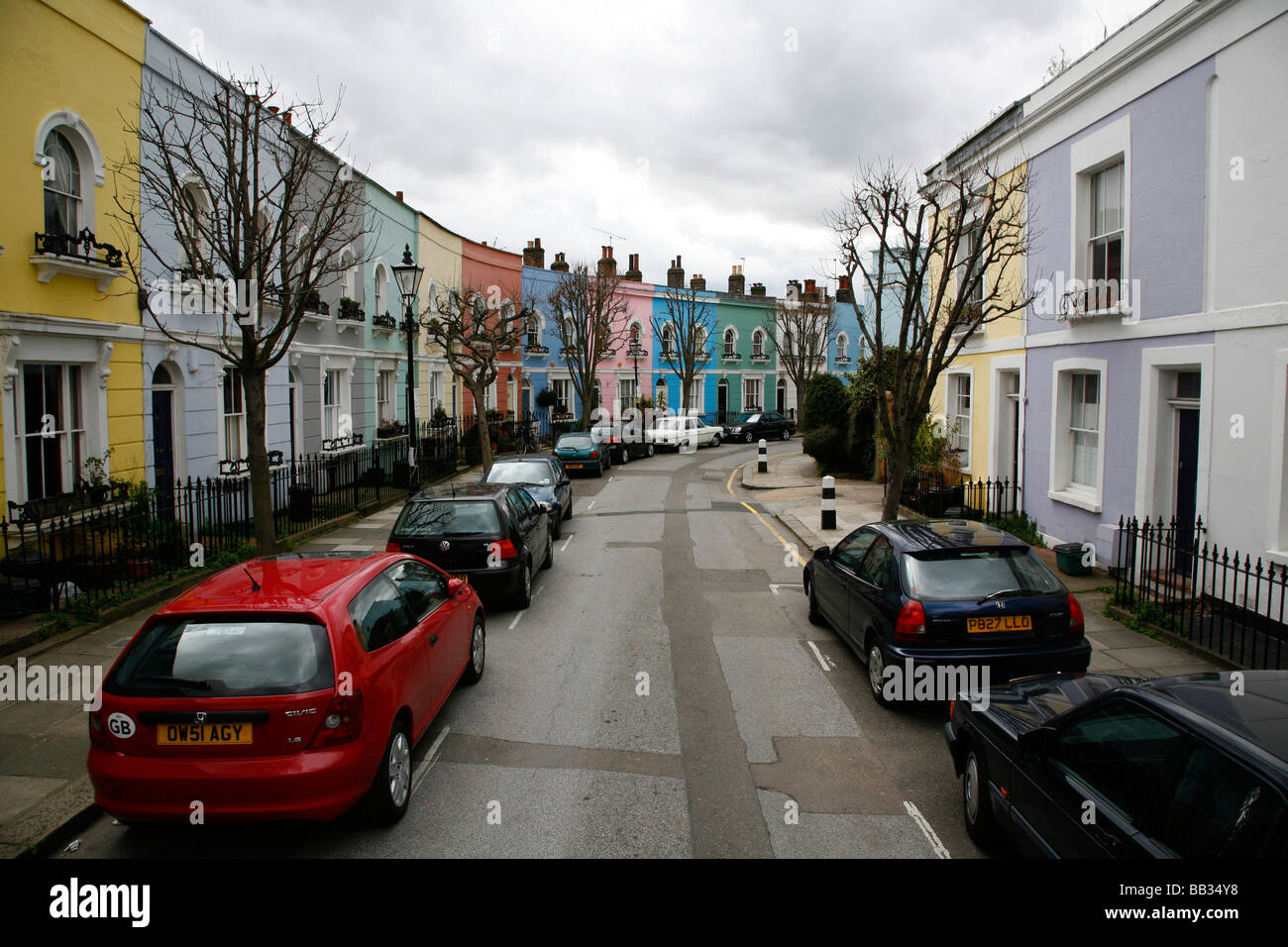 Pastel coloured housing in Kelly Street, Kentish Town, London, UK Stock ...