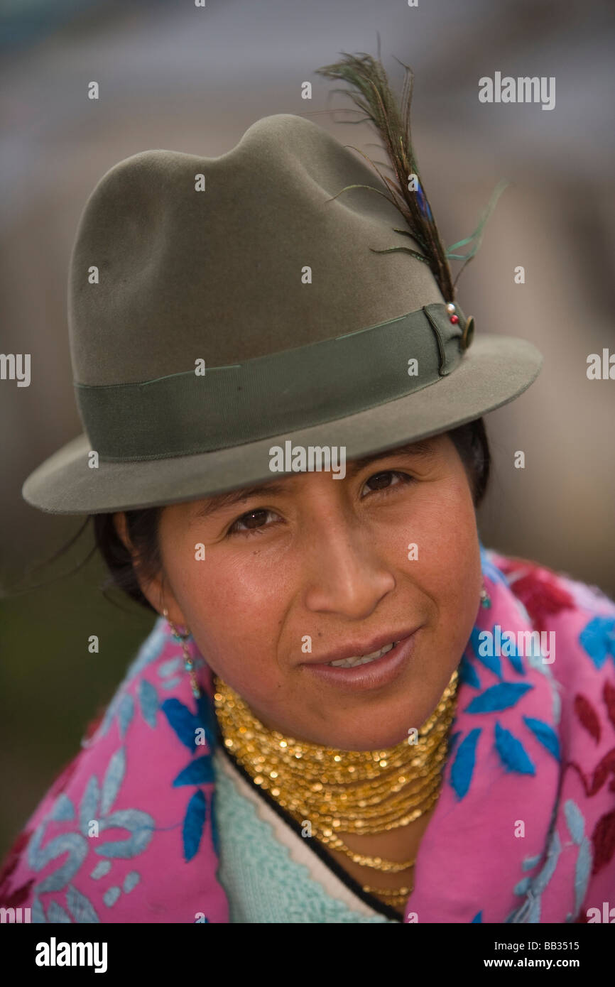 South America Ecuador woman in traditional hat & shawl at weekly market ...