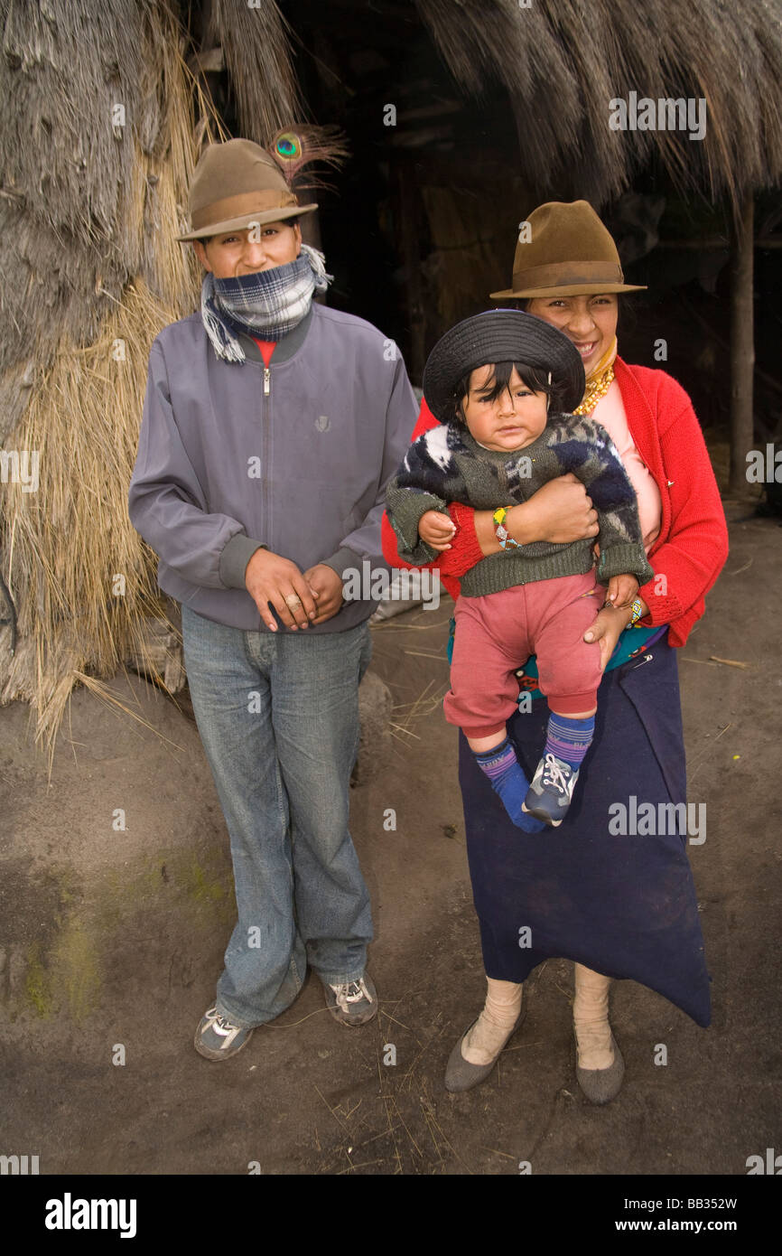 South America, Ecuador, Zumbahua, family near thatched hut, MR Stock ...