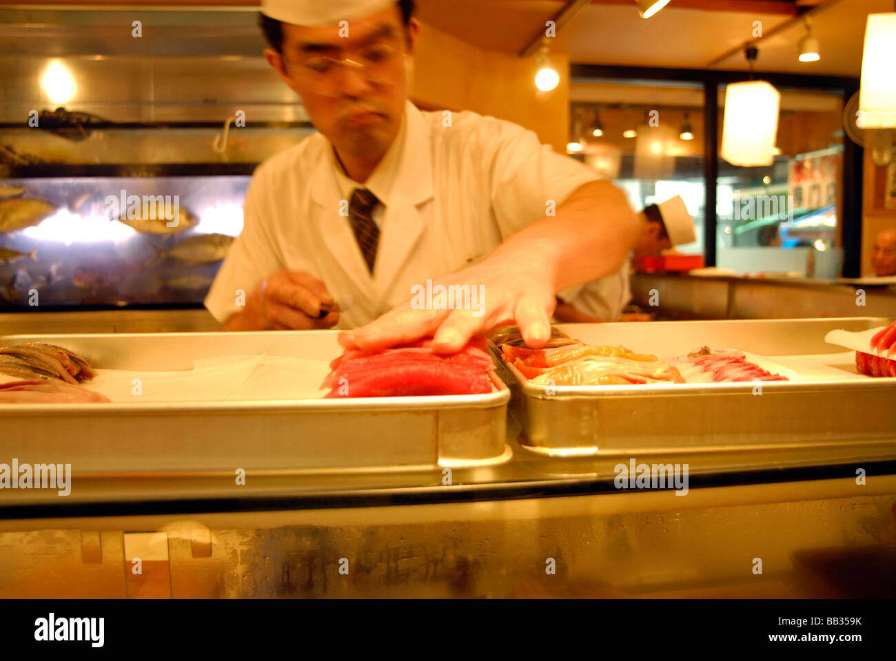 Sushi chef behind sushi bar hi-res stock photography and images - Alamy