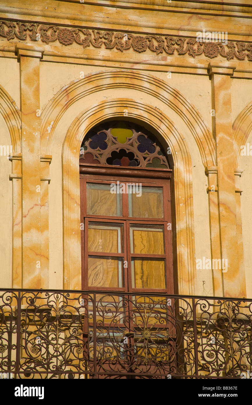 Historic building with arched window & wrought-iron balcony, Cuenca ...