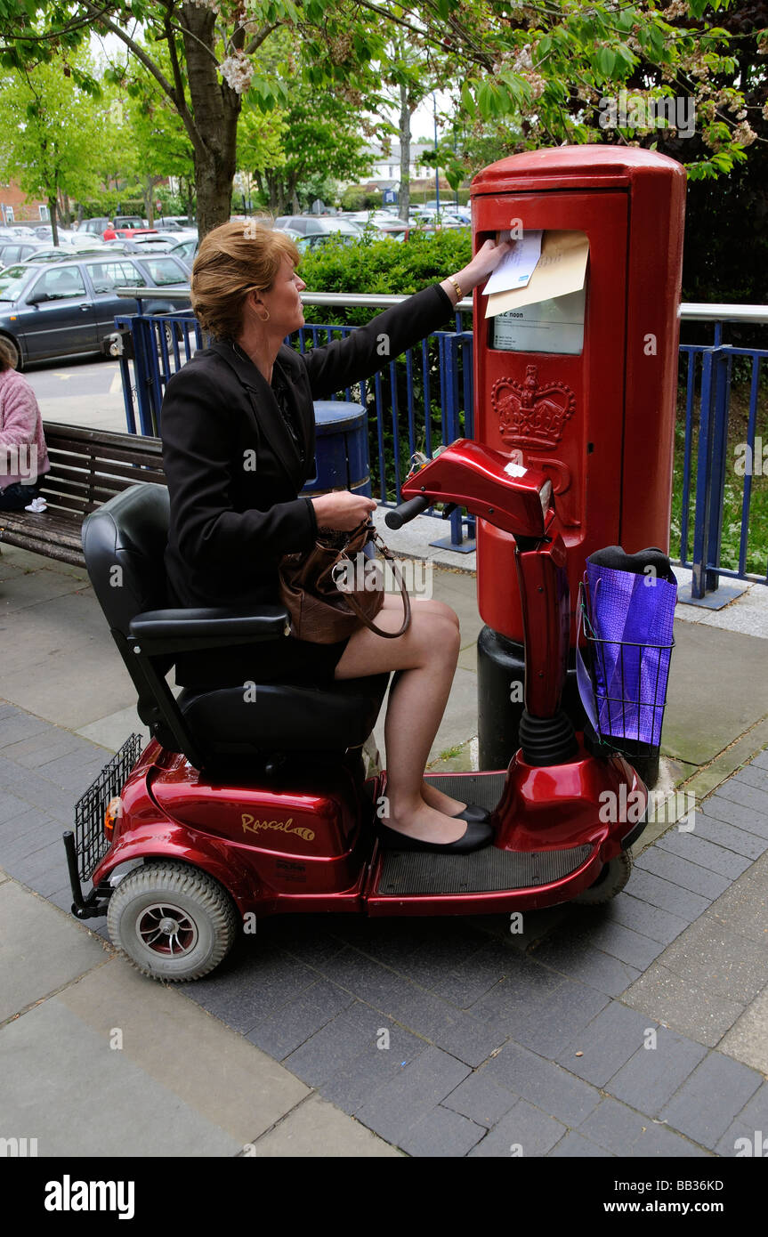 Mature woman posting letter hi-res stock photography and images - Alamy