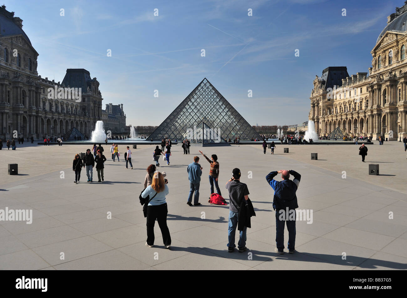 Louvre daytime pyramid hi-res stock photography and images - Alamy