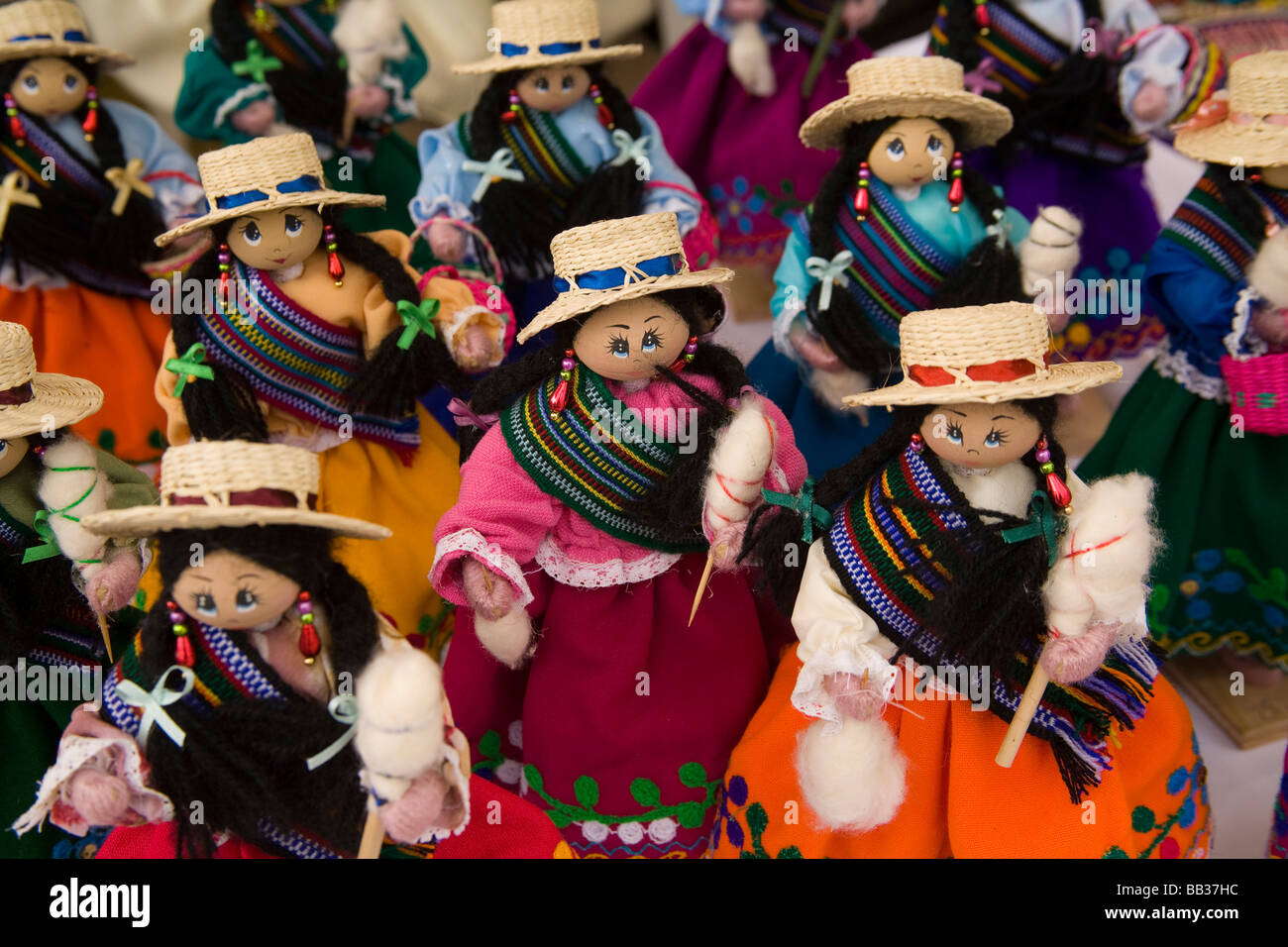 Dolls on display at market, Cuenca, Ecuador, South America Stock Photo ...