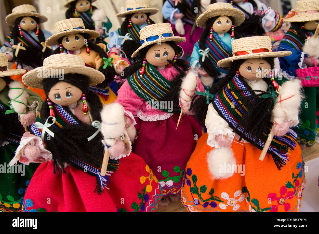Dolls on display at market, Cuenca, Ecuador, South America Stock Photo ...