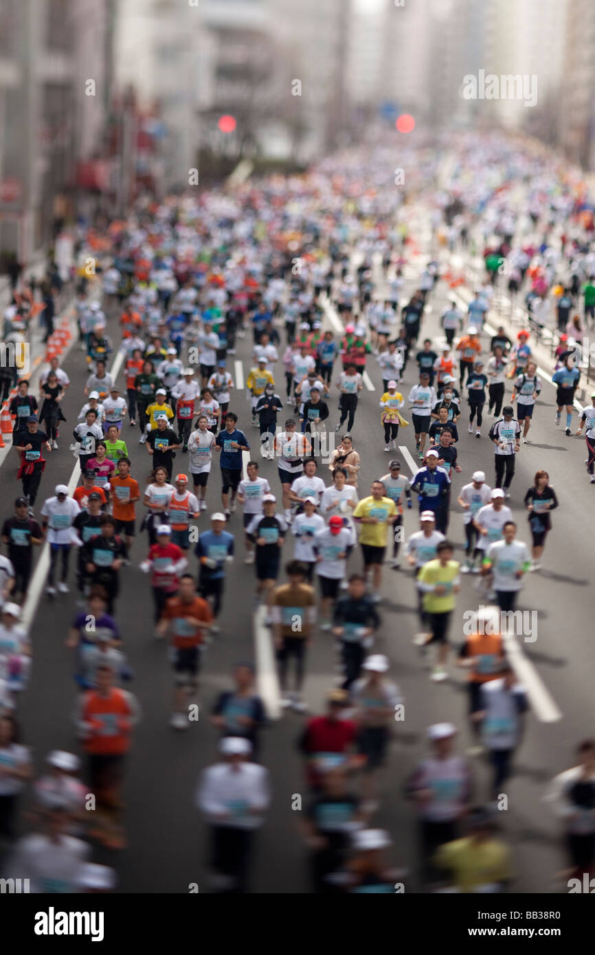 High angle shot of a large group of mainly asian runners during the ...