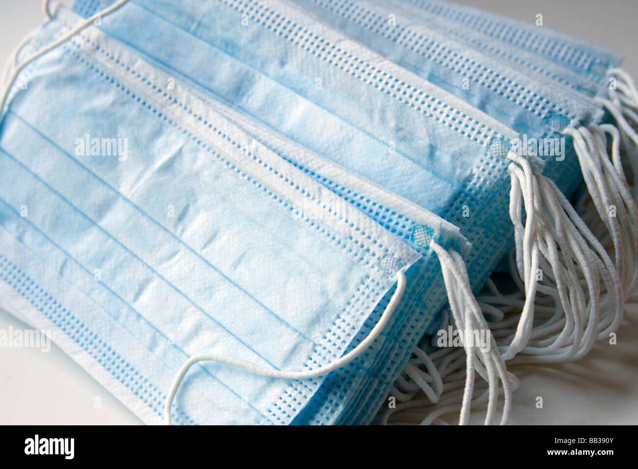 Bunch of blue surgical protection masks Stock Photo - Alamy