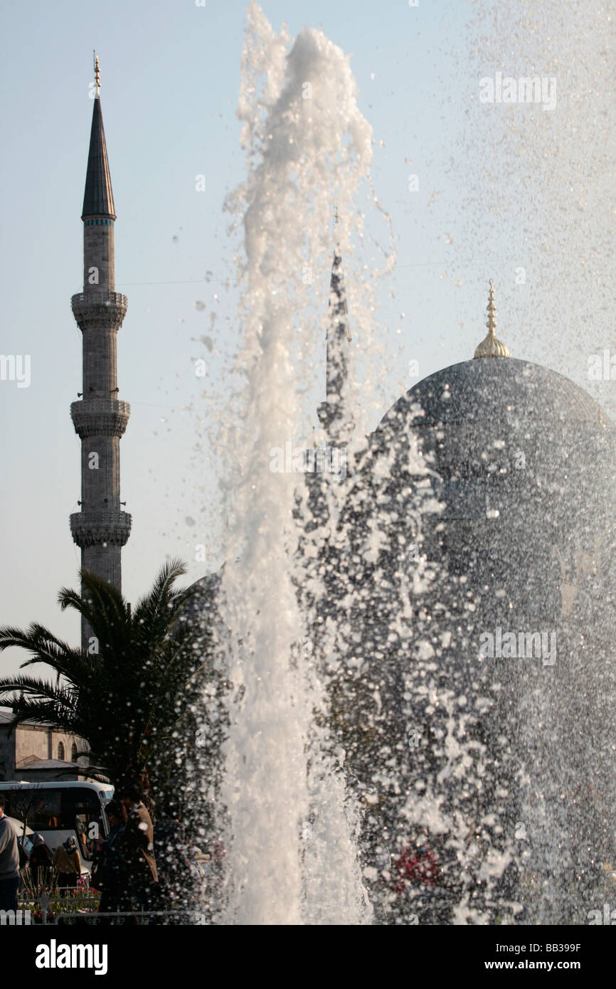 Blue Mosque viewed through the fountains of Sultanahmet in Istanbul ...
