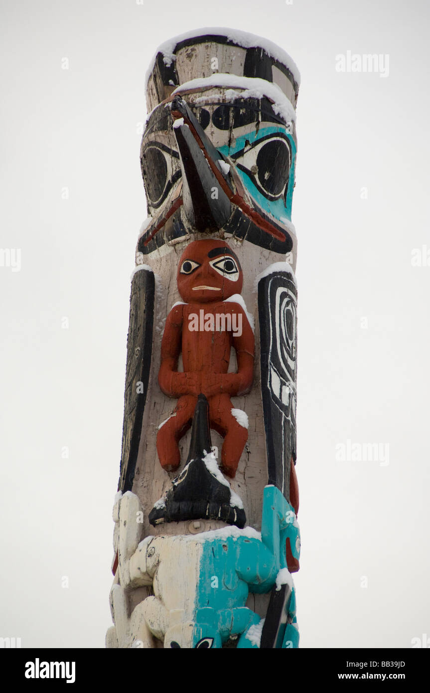 Canada, Alberta, Jasper. Snow covered totem pole Stock Photo - Alamy
