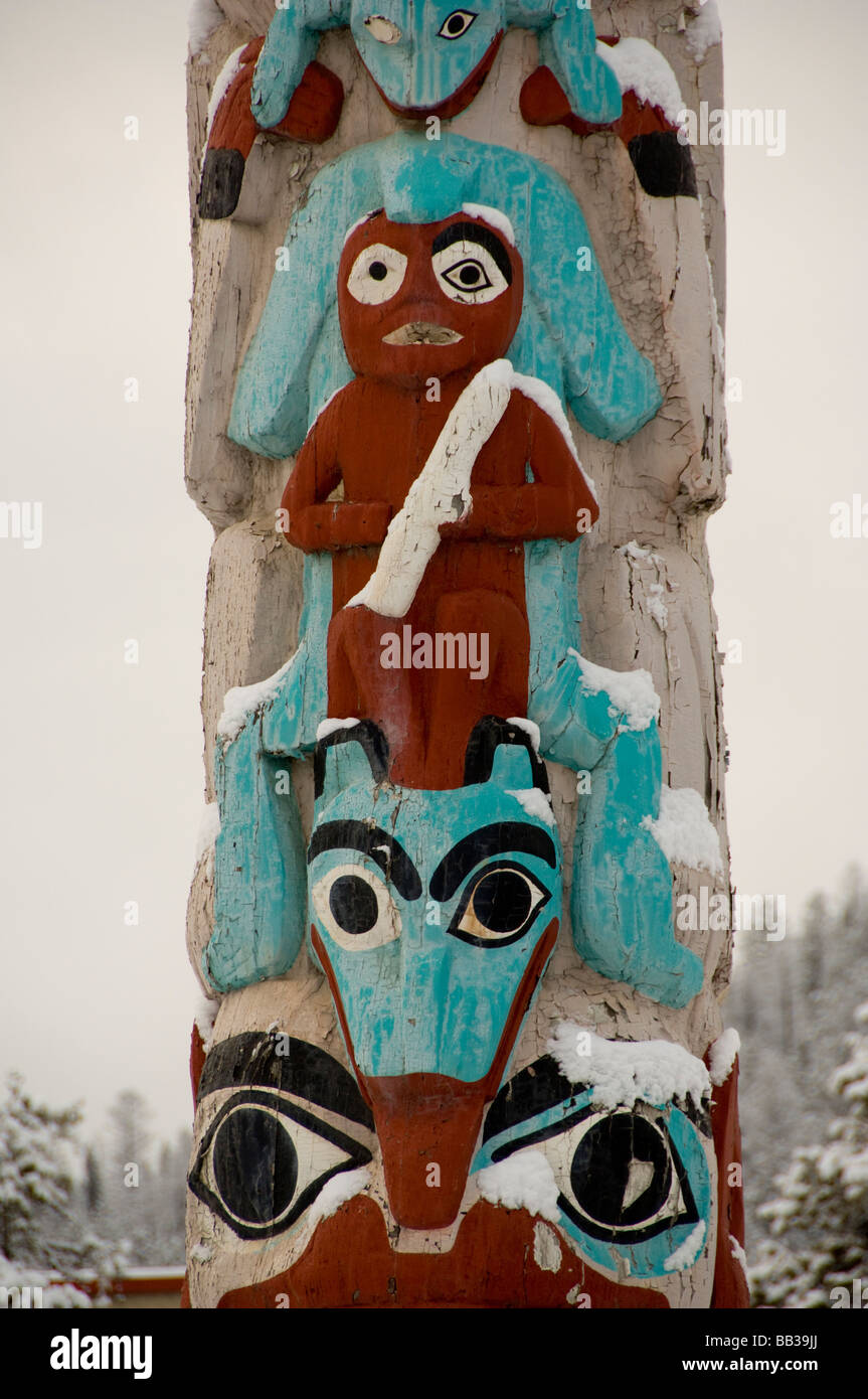 Canada, Alberta, Jasper. Snow covered totem pole Stock Photo - Alamy