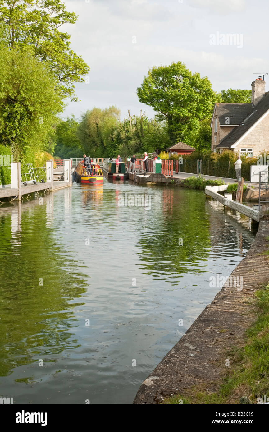 Narrowboats negotiating Osney Lock on the River Thames in Oxford Uk ...