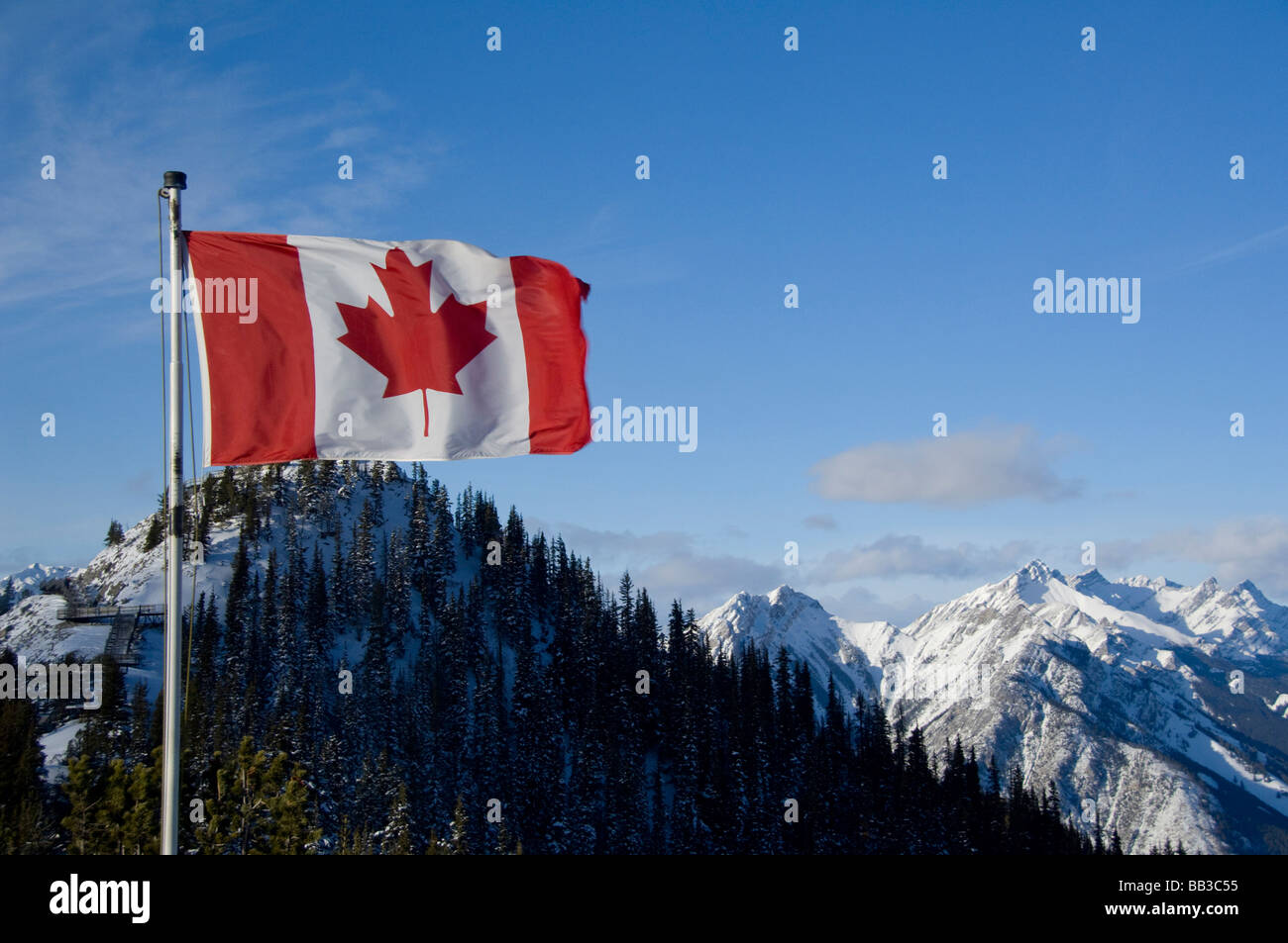 Canada, Alberta, Banff. Mountain views with Canadian flag on the summit ...
