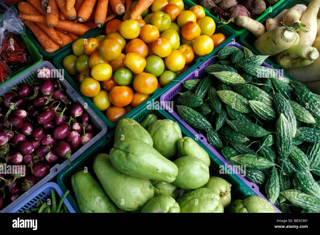Asia, Singapore. Fresh produce for sale at street market Stock Photo ...