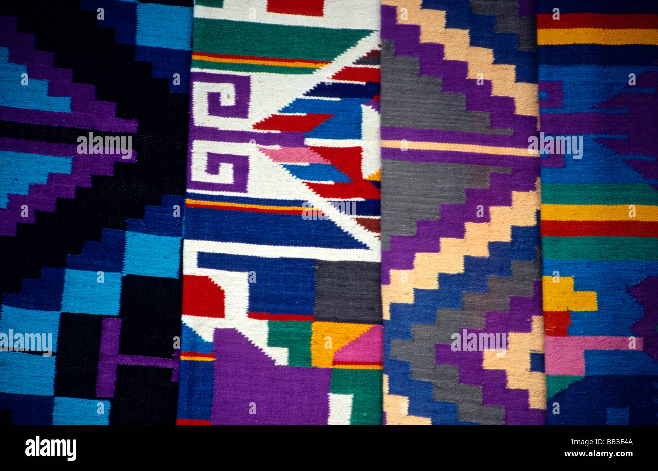 Central America, Guatemala, Antigua. Colorful woven textiles of ...