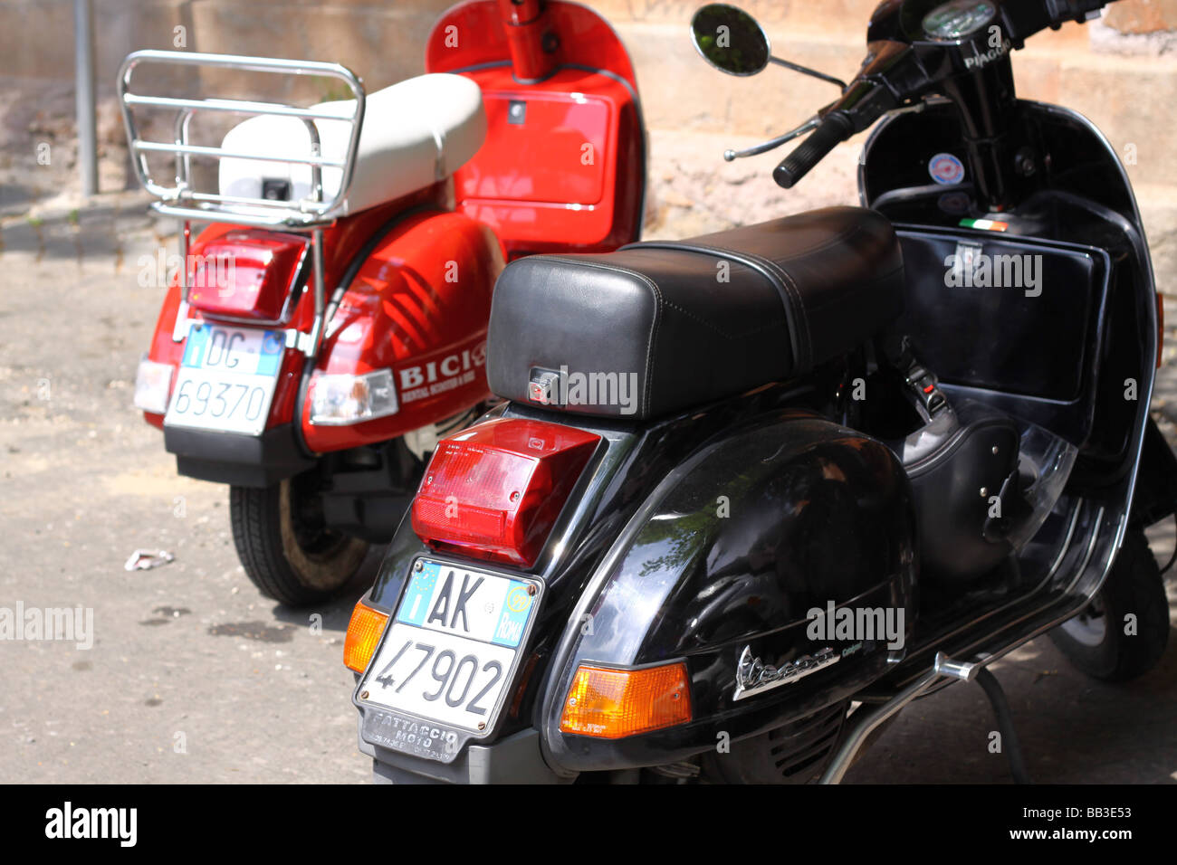Two Vespa scooters in Rome, Italy Stock Photo - Alamy