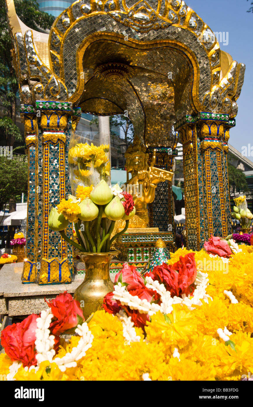 The four-faced four-armed Erawan Shrine (San Phra Phrom) in front of ...
