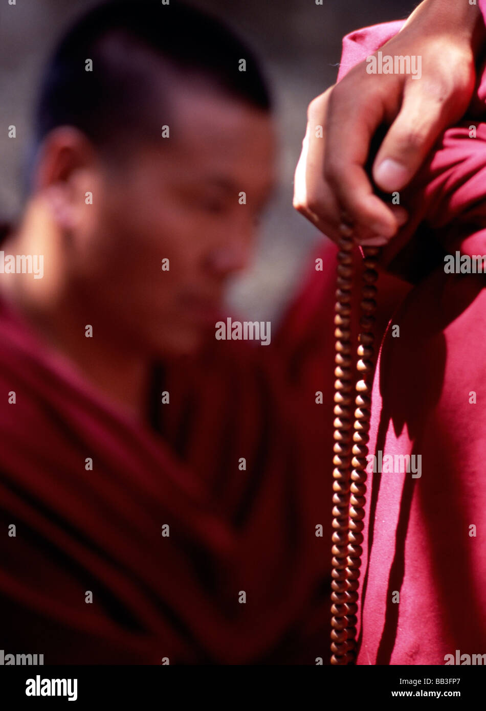 Buddhist monks prayer beads hi-res stock photography and images - Alamy