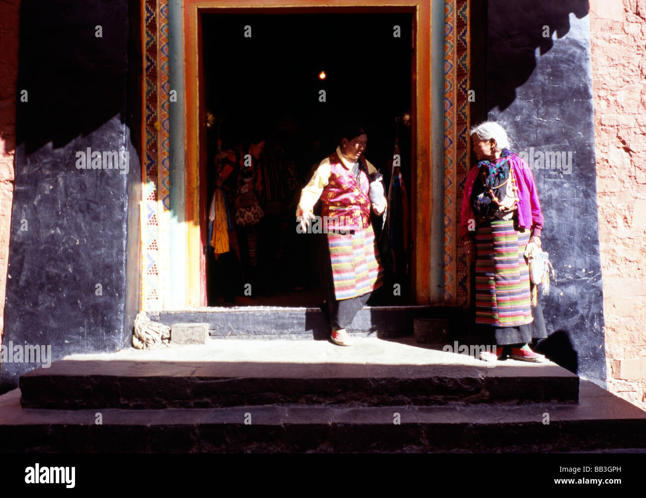Tibetan women outside monastery, Lhasa, Tibet Stock Photo - Alamy