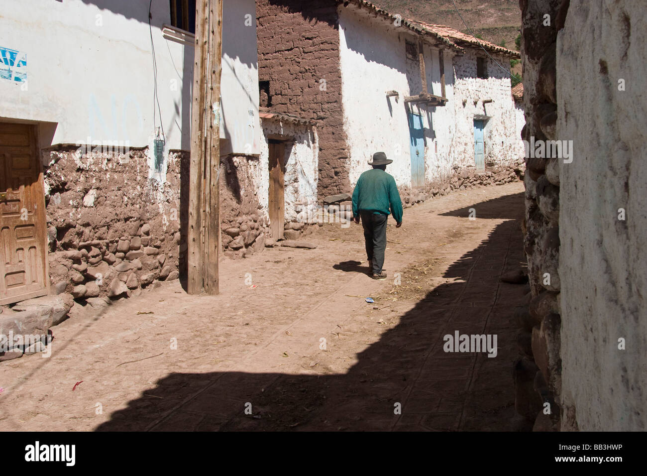 Person walking in street, Pisac, Peru Stock Photo - Alamy