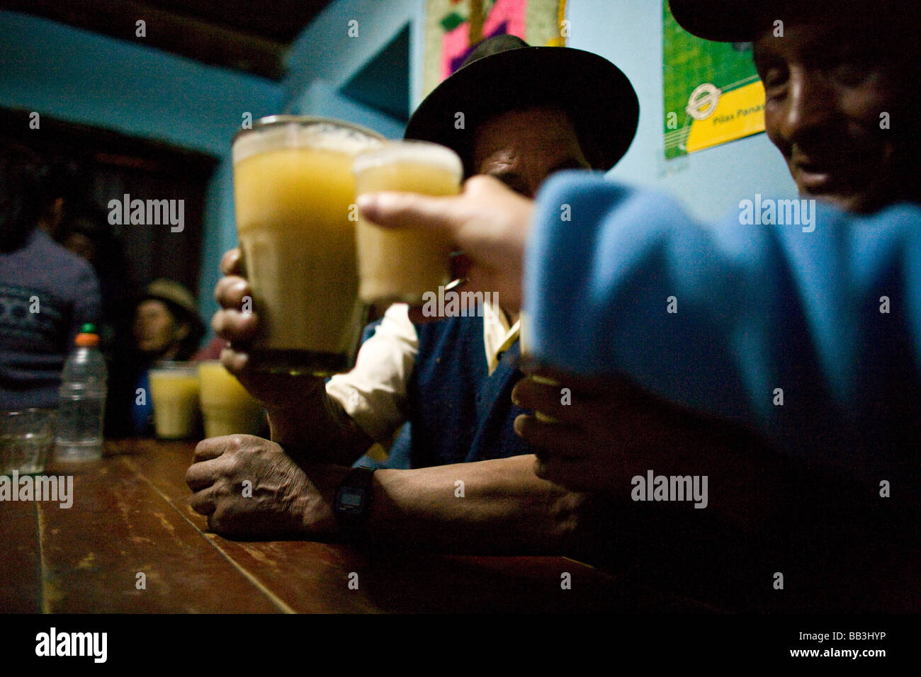 Peruvians drinking chicha or beer, Ollantayambo, Peru Stock Photo - Alamy