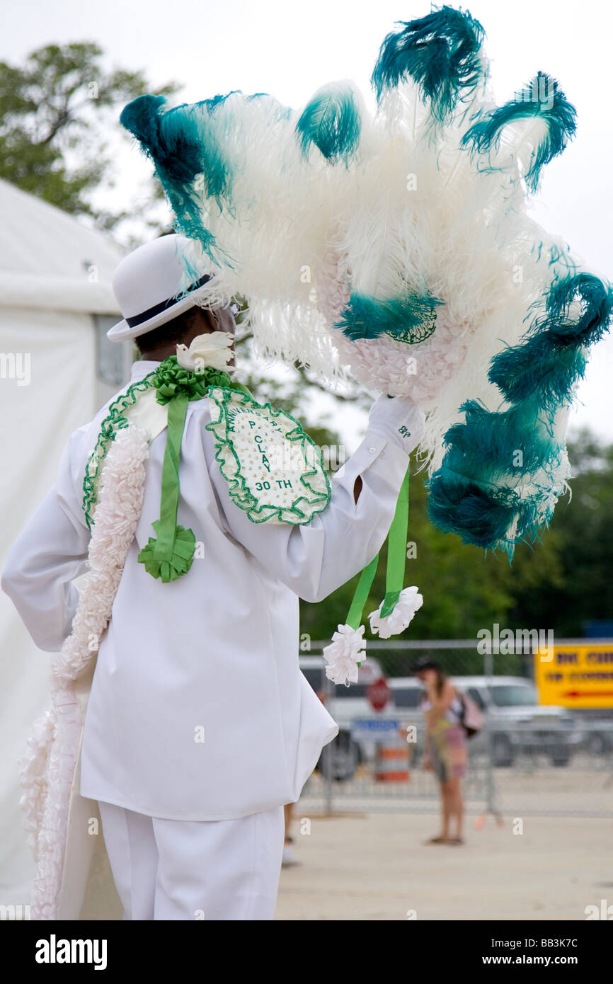 USA, Louisiana, New Orleans. A Second Line member marching in ...