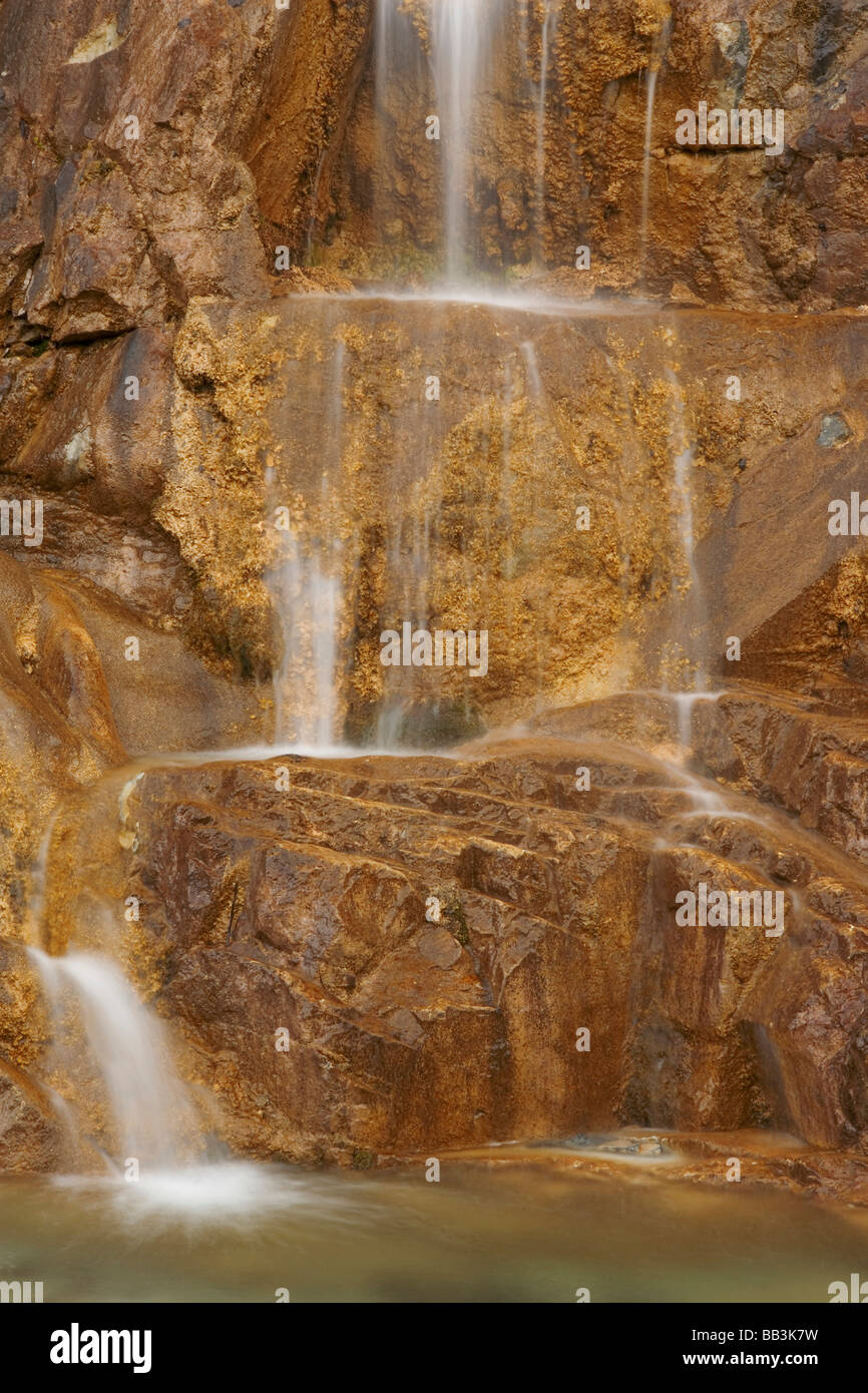 USA, Alaska, Alsek River Valley. Glacial waterfall along Alsek River ...