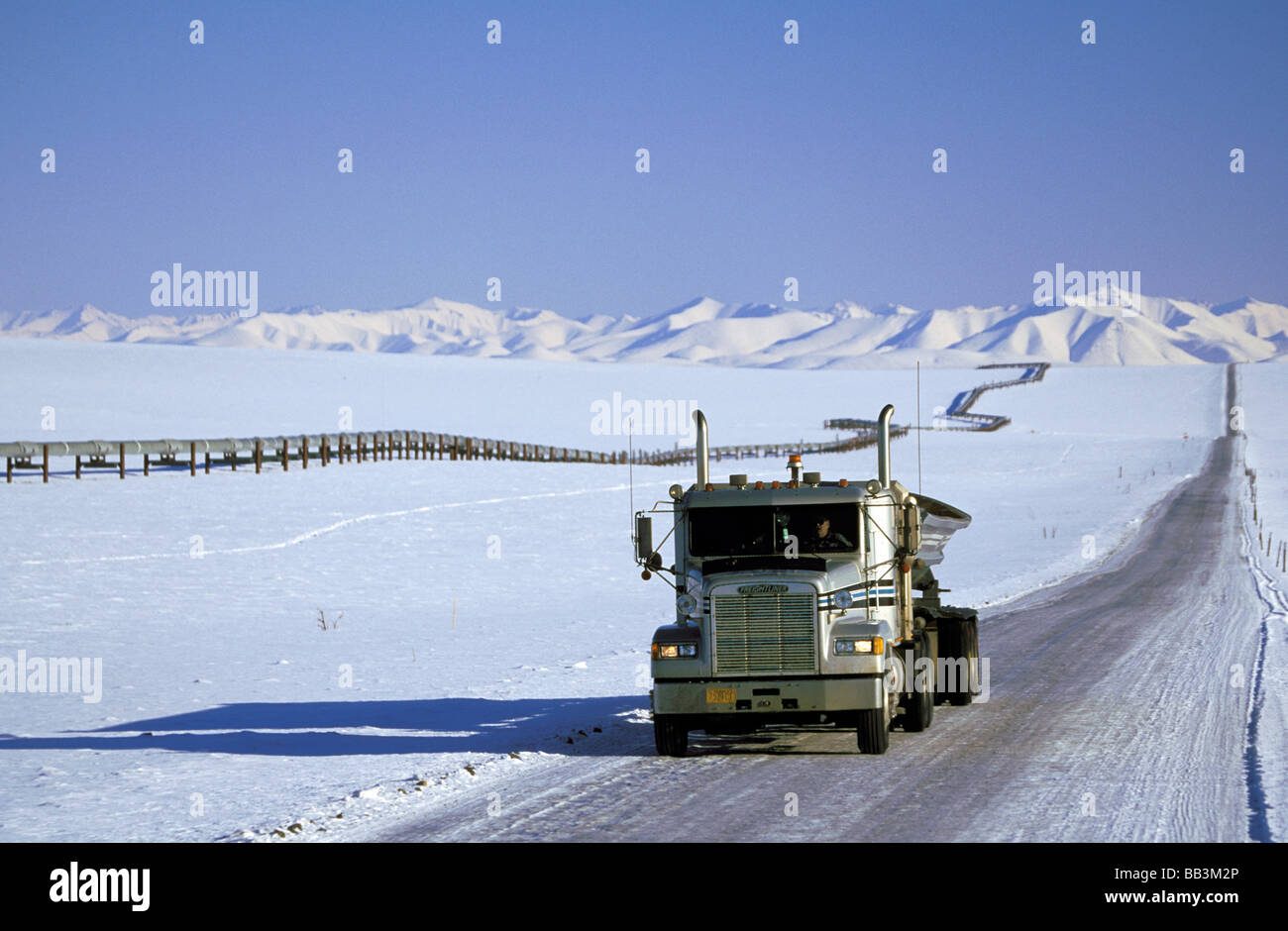 North America, USA, Alaska. Truck on the Dalton Highway, next to the ...