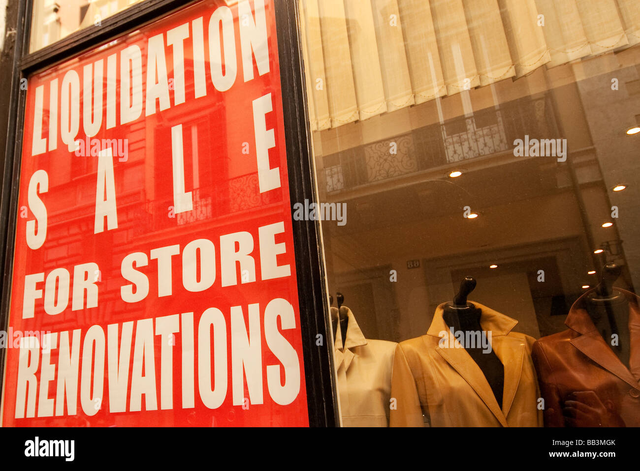 liquidation sale sign in a shop window Stock Photo - Alamy