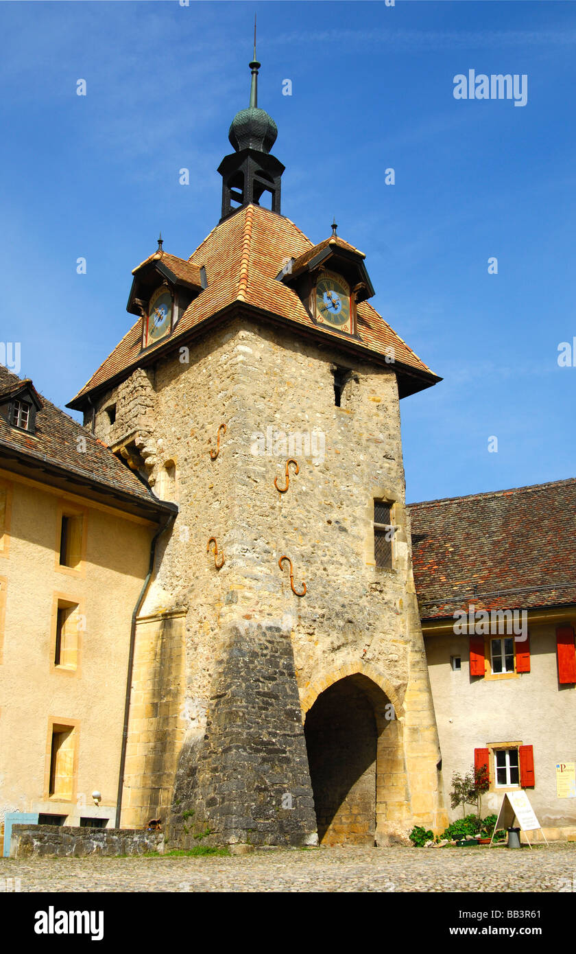 Clock tower of the Romanesque abbey of Romainmotier, canton of Vaud ...