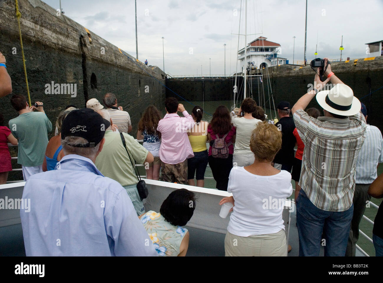 A Panama Canal transit tour boat going through Pedro Miguel Locks Stock ...