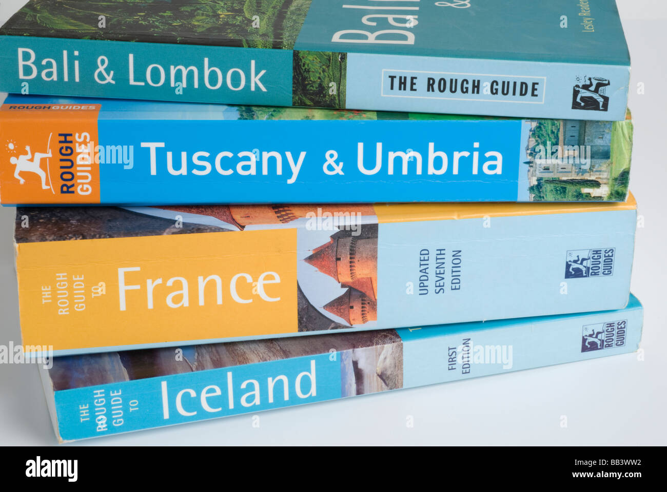 Travel books stacked and ready to read in order to choose a trip Stock ...