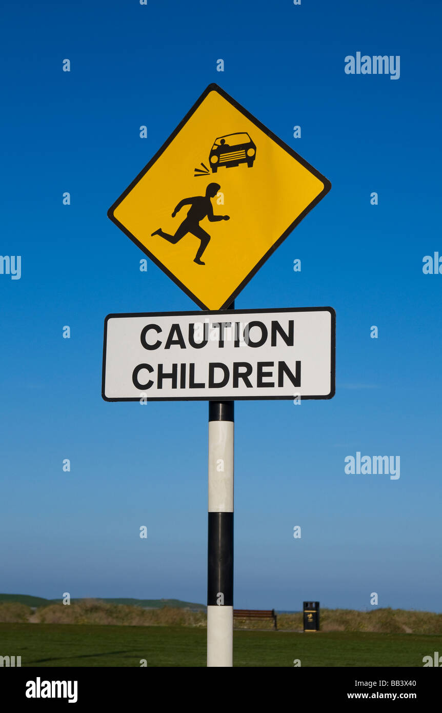 A road sign saying: Caution children - warning of the presence of ...