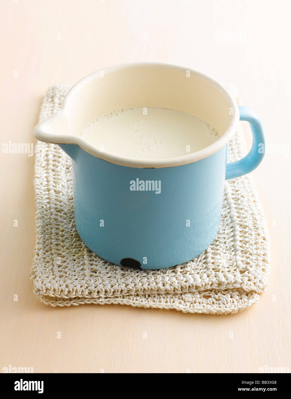 Pot of milk, close-up Stock Photo - Alamy