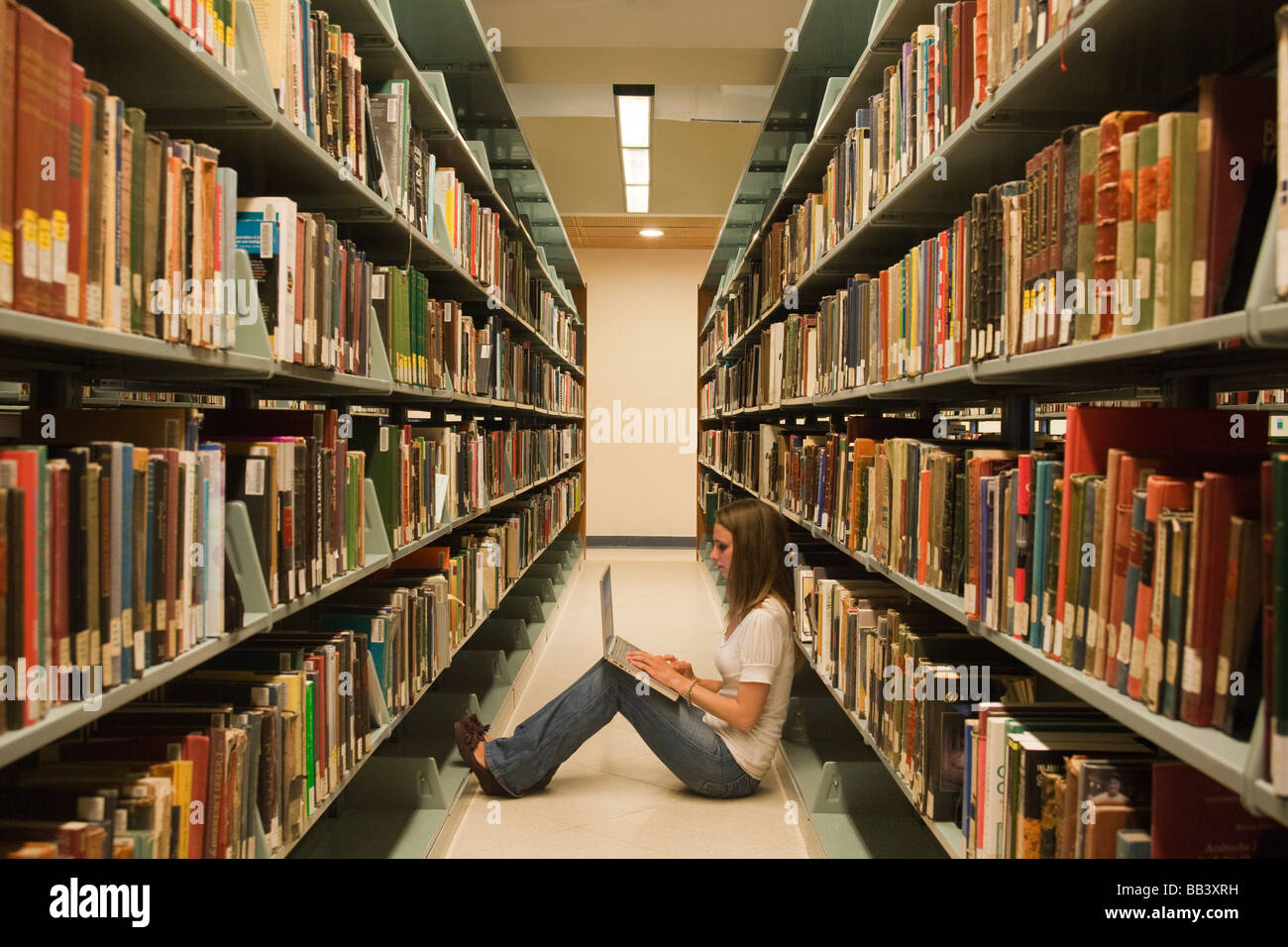 student working with computer in university library Stock Photo - Alamy