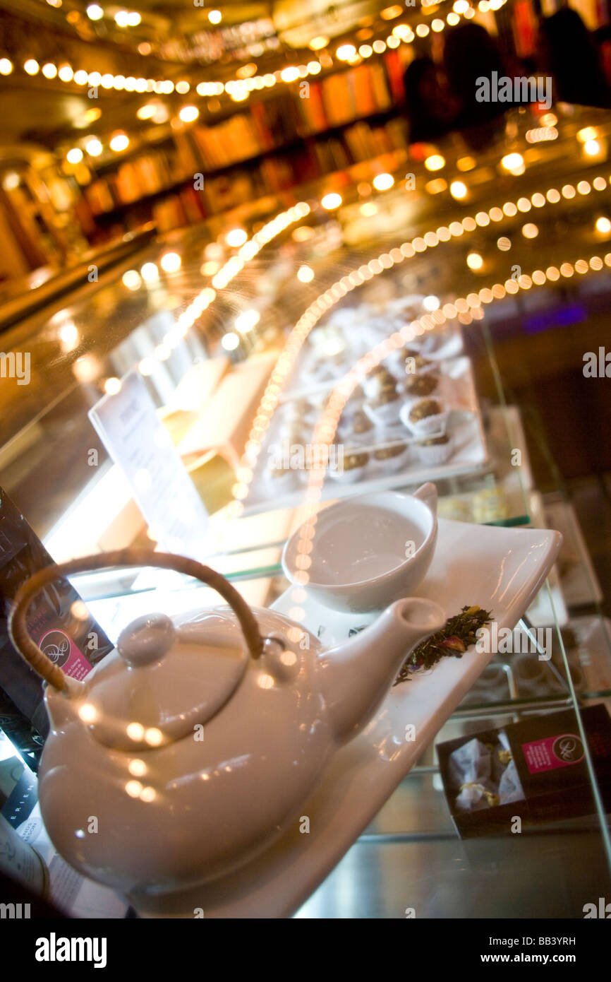 Display of tea teapot and cakes in bookstore Del Ateneo formerly a ...