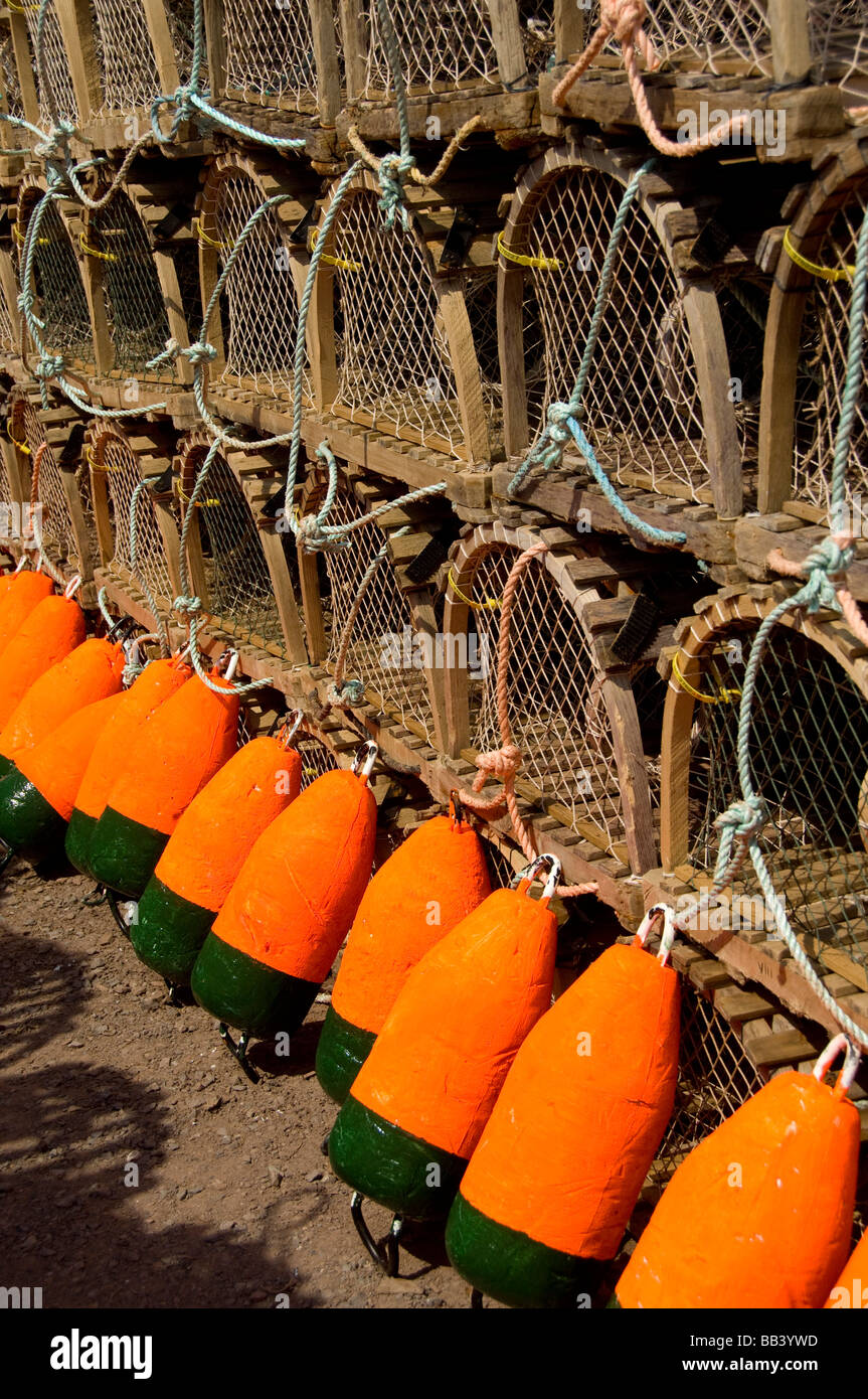 Canada, Prince Edward Island, Rustico. Lobster traps & colorful floats ...