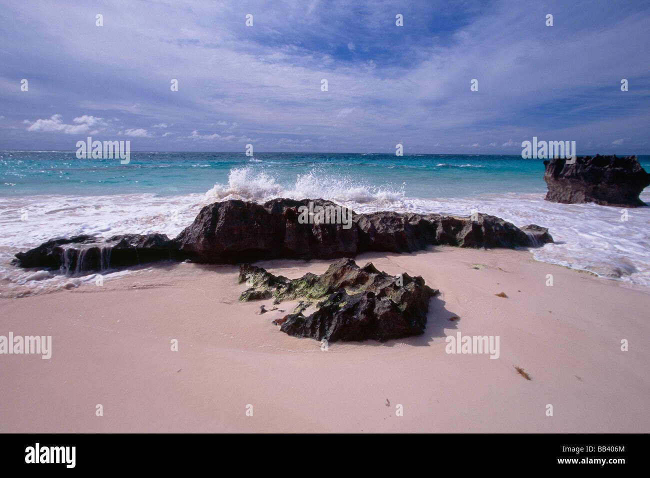 Rocks Waves and Pink Sand Elbow Beach Bermuda Stock Photo - Alamy