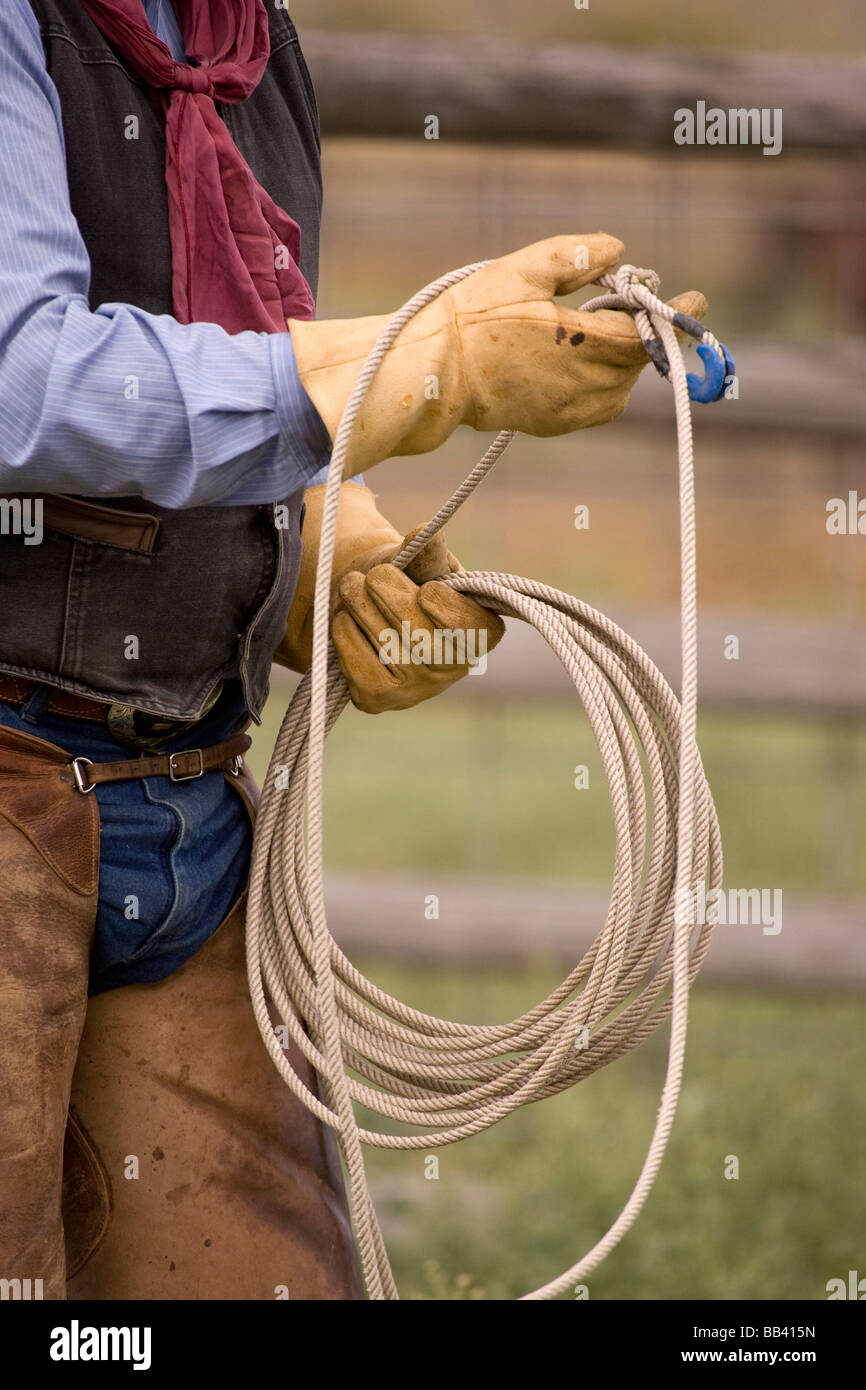 Cowboy with coiled rope hi-res stock photography and images - Alamy