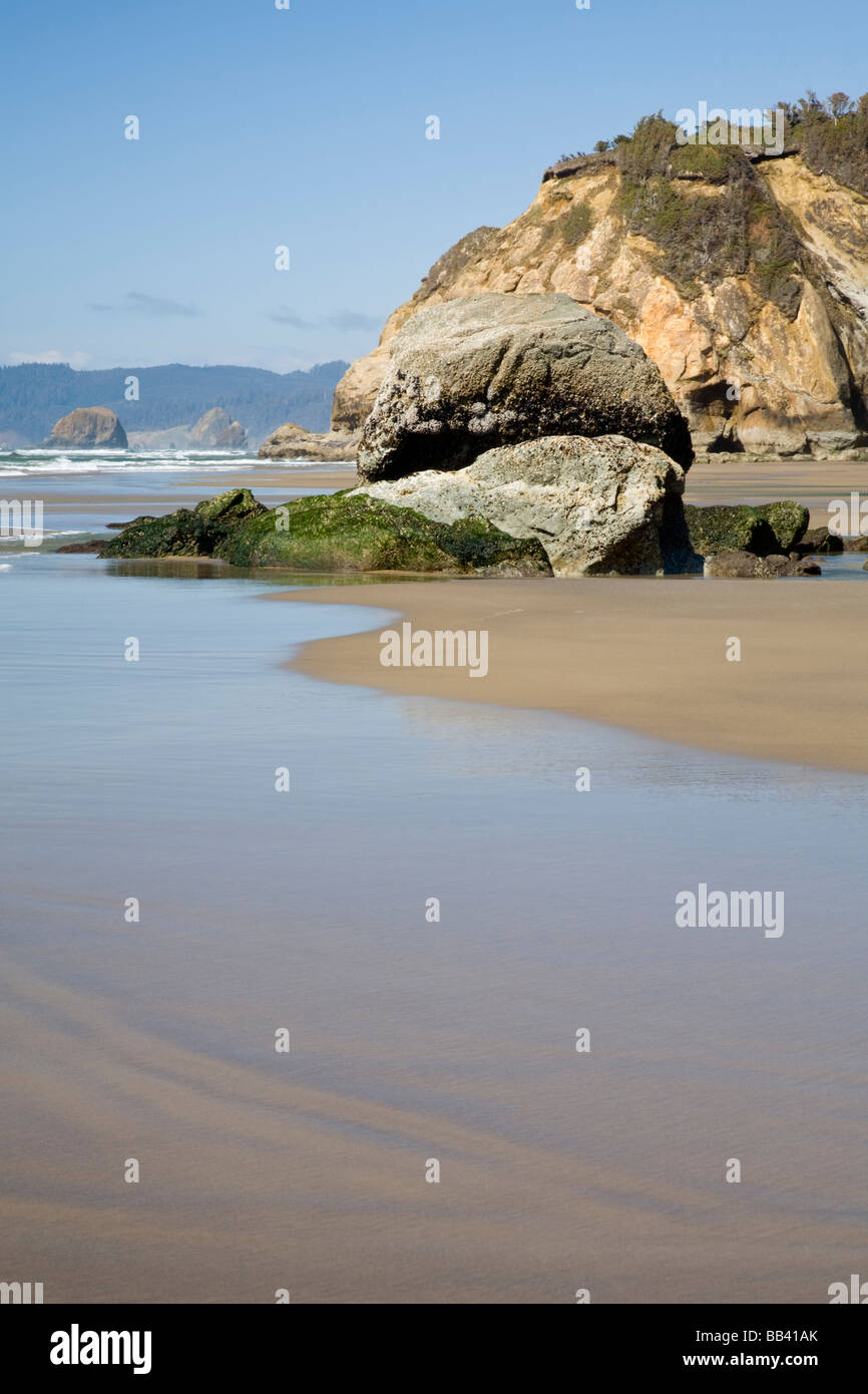 OR, Oregon Coast, Hug Point, Rocks at the shore, shaped by ocean waves ...