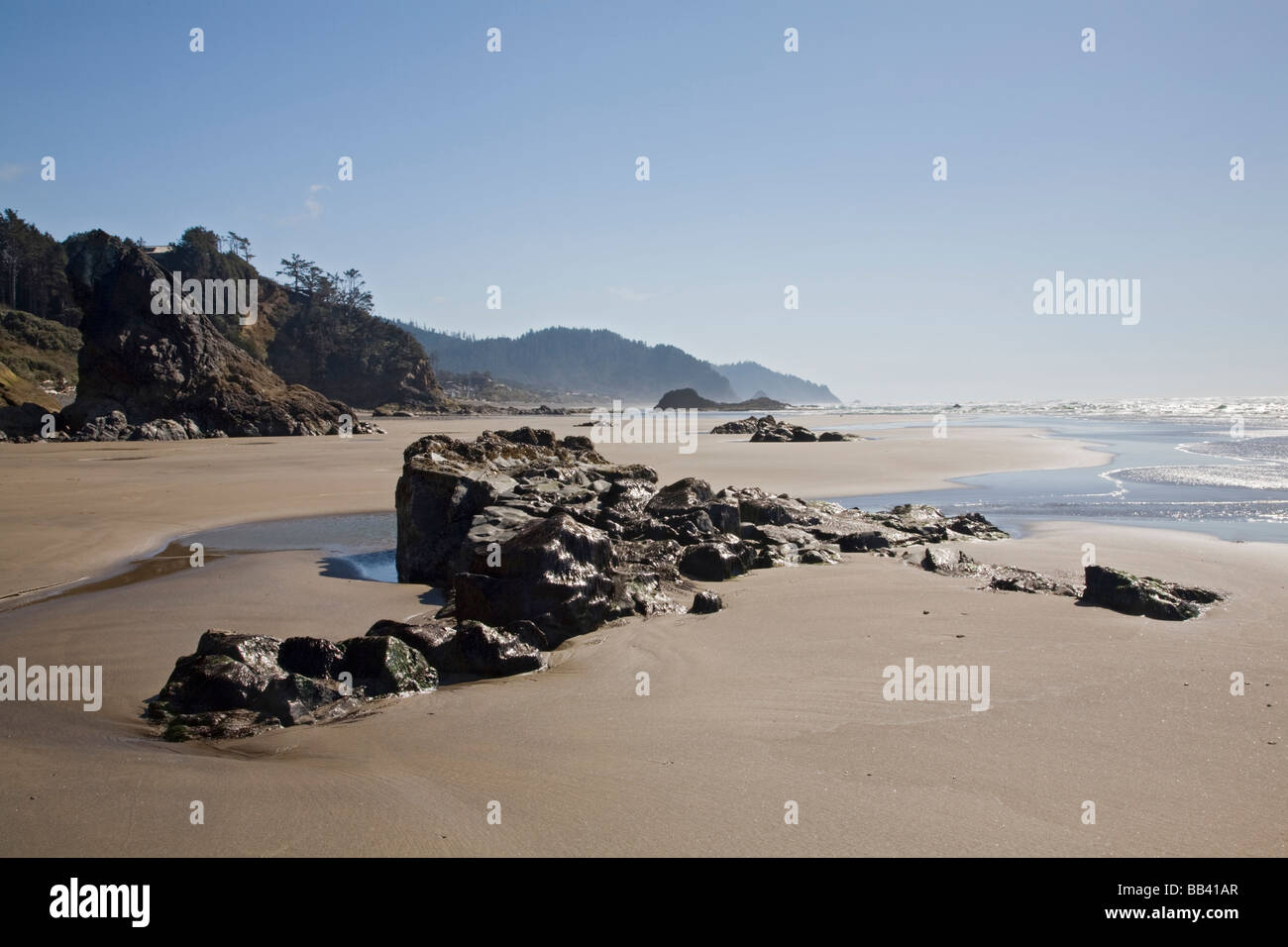 OR, Oregon Coast, Hug Point, Rocks at the shore, shaped by ocean waves ...