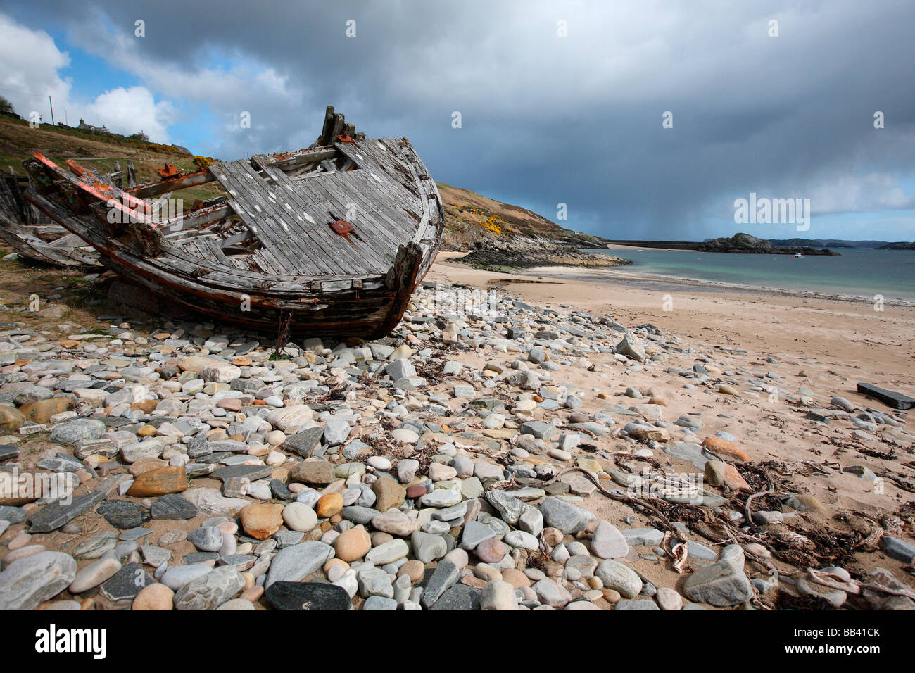 remains of an old wooden boat on the shore of Talmine Bay near Kyle of ...
