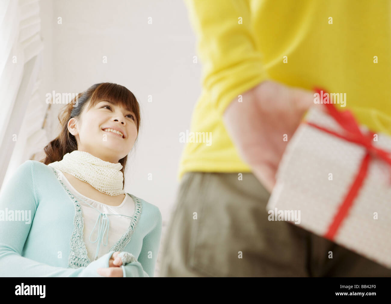Woman receiving a present Stock Photo - Alamy