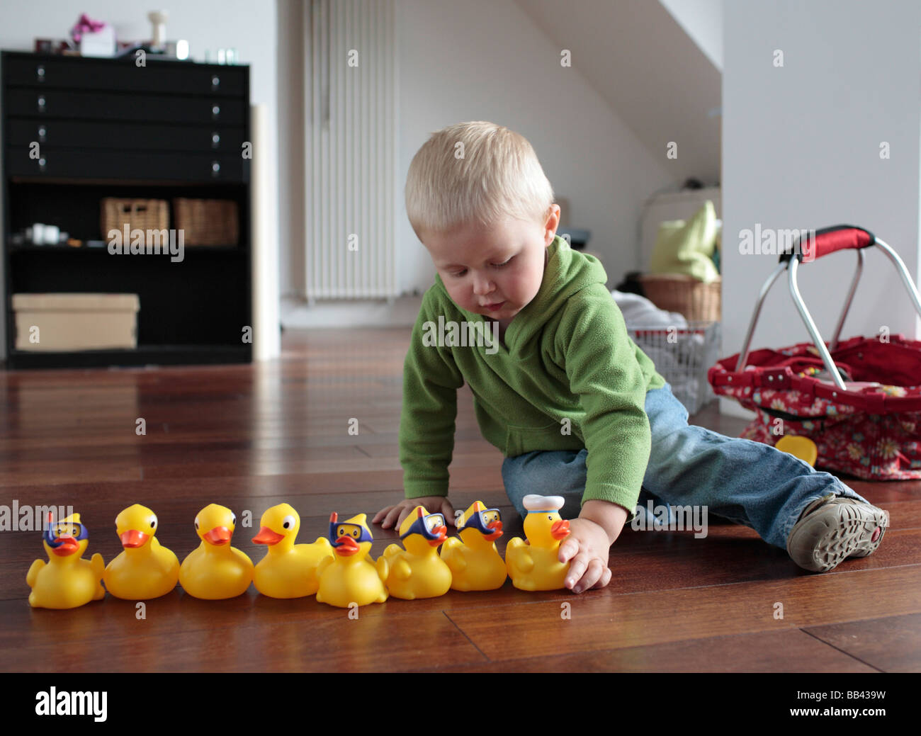 Boy two years old playing Stock Photo - Alamy