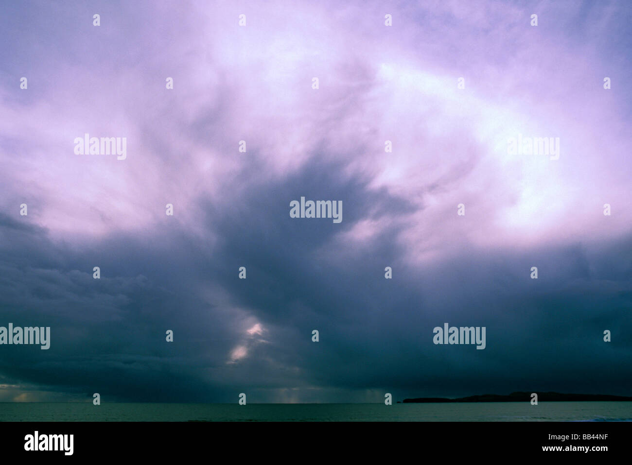 North America, USA, California, Limantour Beach. Rain falling over the ...