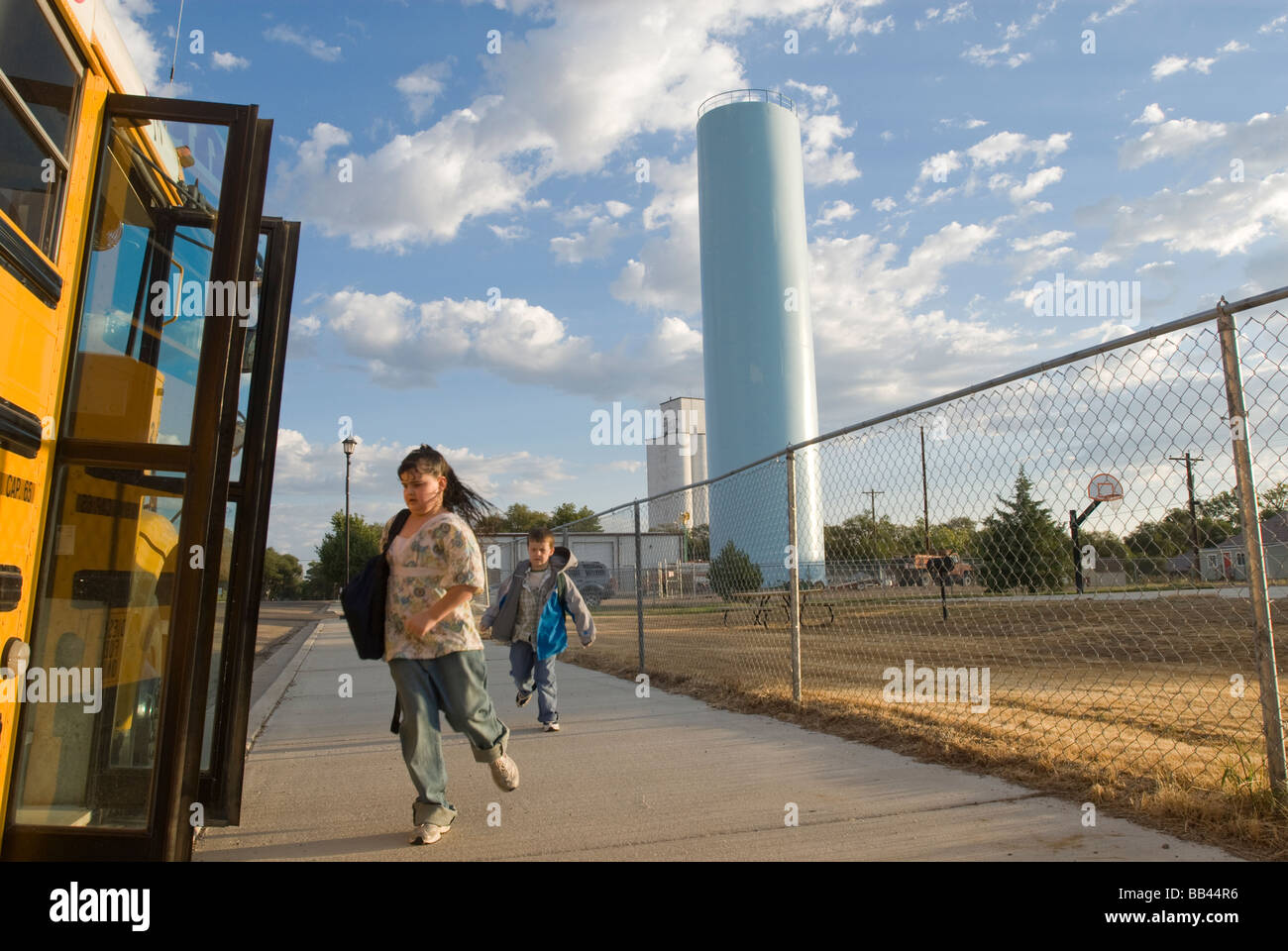 Catching the school bus in Sugar City, Colorado Stock Photo - Alamy