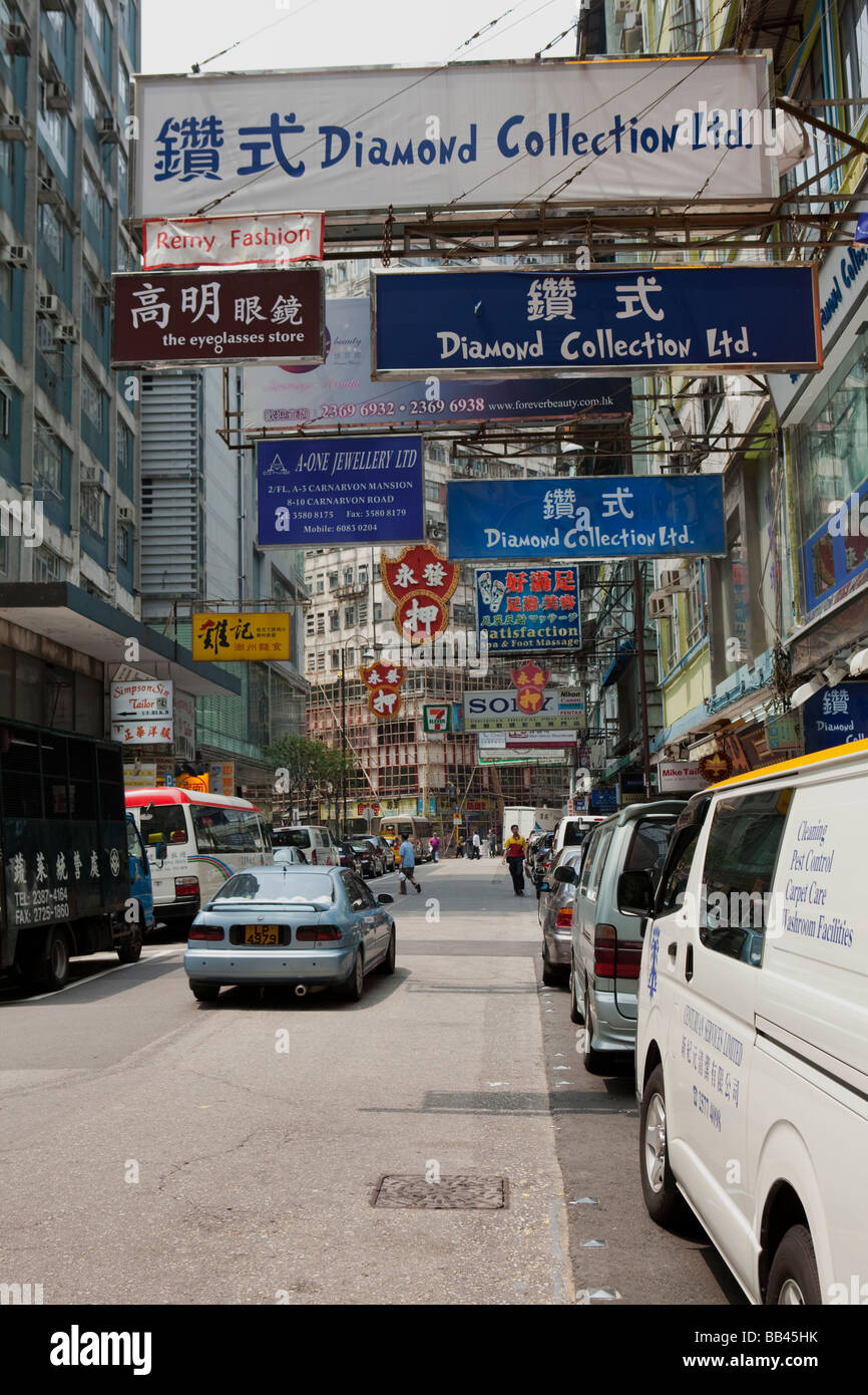 Street signs are seen on a Kowloon street in Hong Kong Stock Photo - Alamy