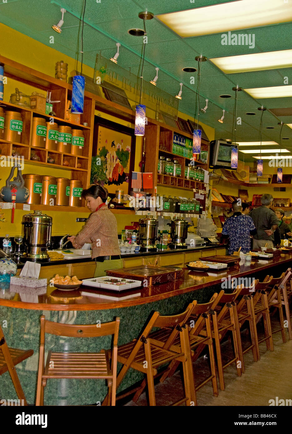 San Francisco Chinatown an Asian Tea Shop and tasting bar, with a woman ...