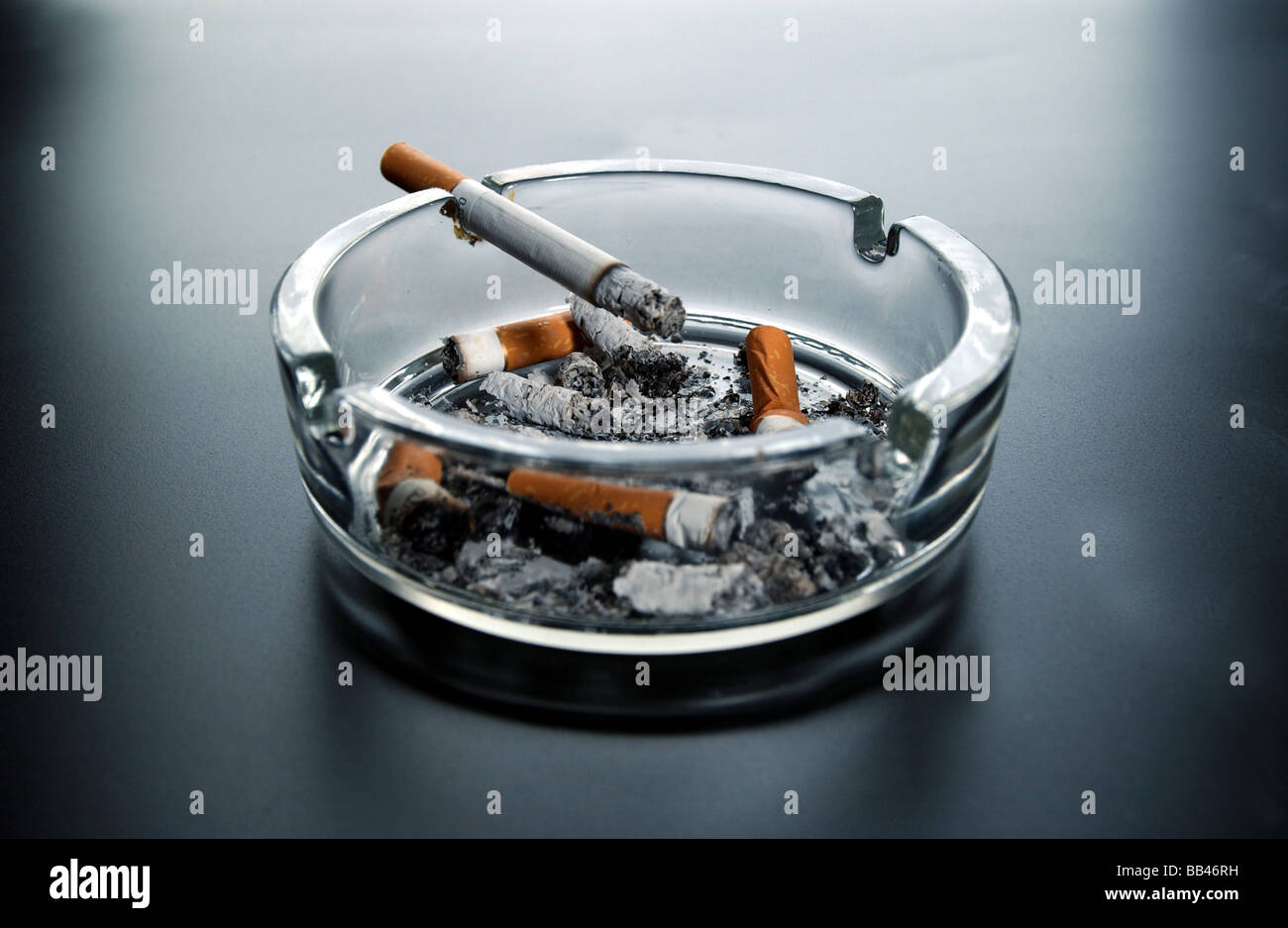 cigarettes in an ashtray Stock Photo - Alamy