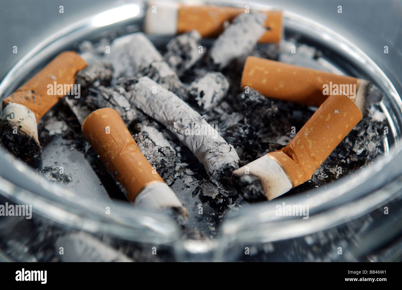 cigarettes in an ashtray Stock Photo - Alamy