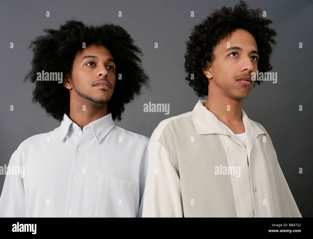 Two African American brothers stand shoulder to shoulder Stock Photo ...
